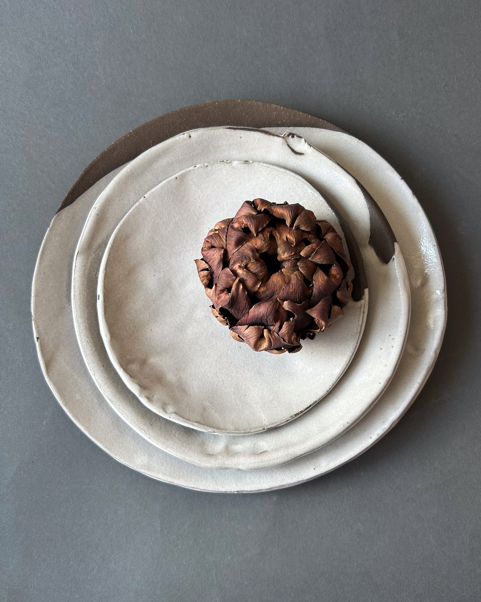 Moon Plate, White on Umber – MONDAYS